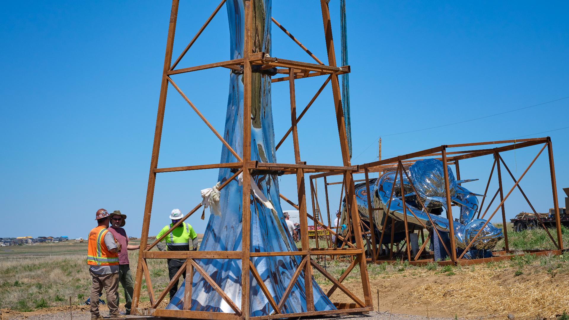 New 58-foot tall 'Liberty' art sculpture installed at The Aurora ...