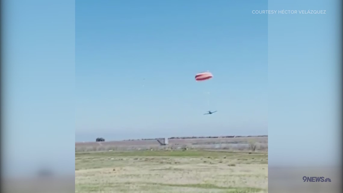 WATCH: Plane uses parachute to land after midair collision | 9news.com