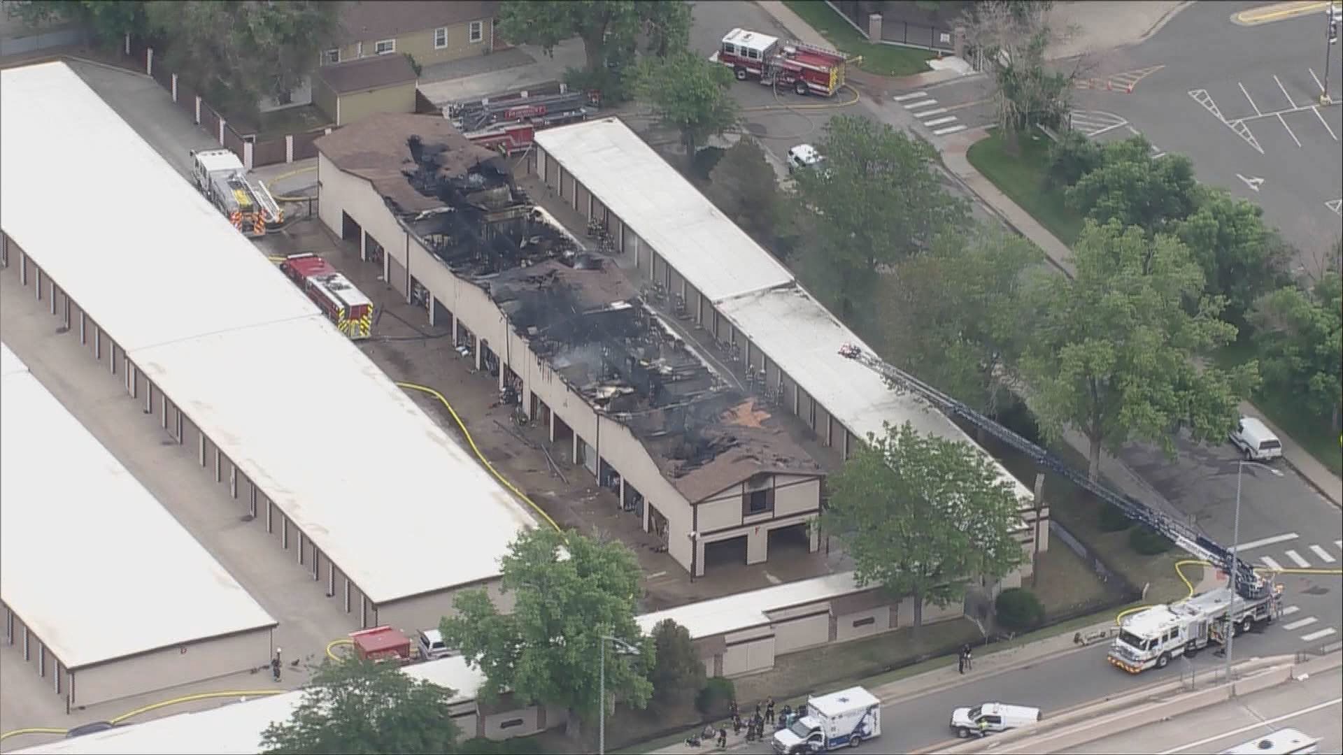 2 firefighters injured battling storage unit fire in Arvada | 9news.com