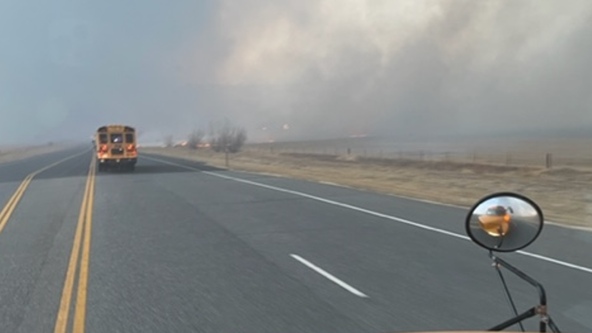 PHOTOS: School buses drive through flames to help with Marshall Fire ...