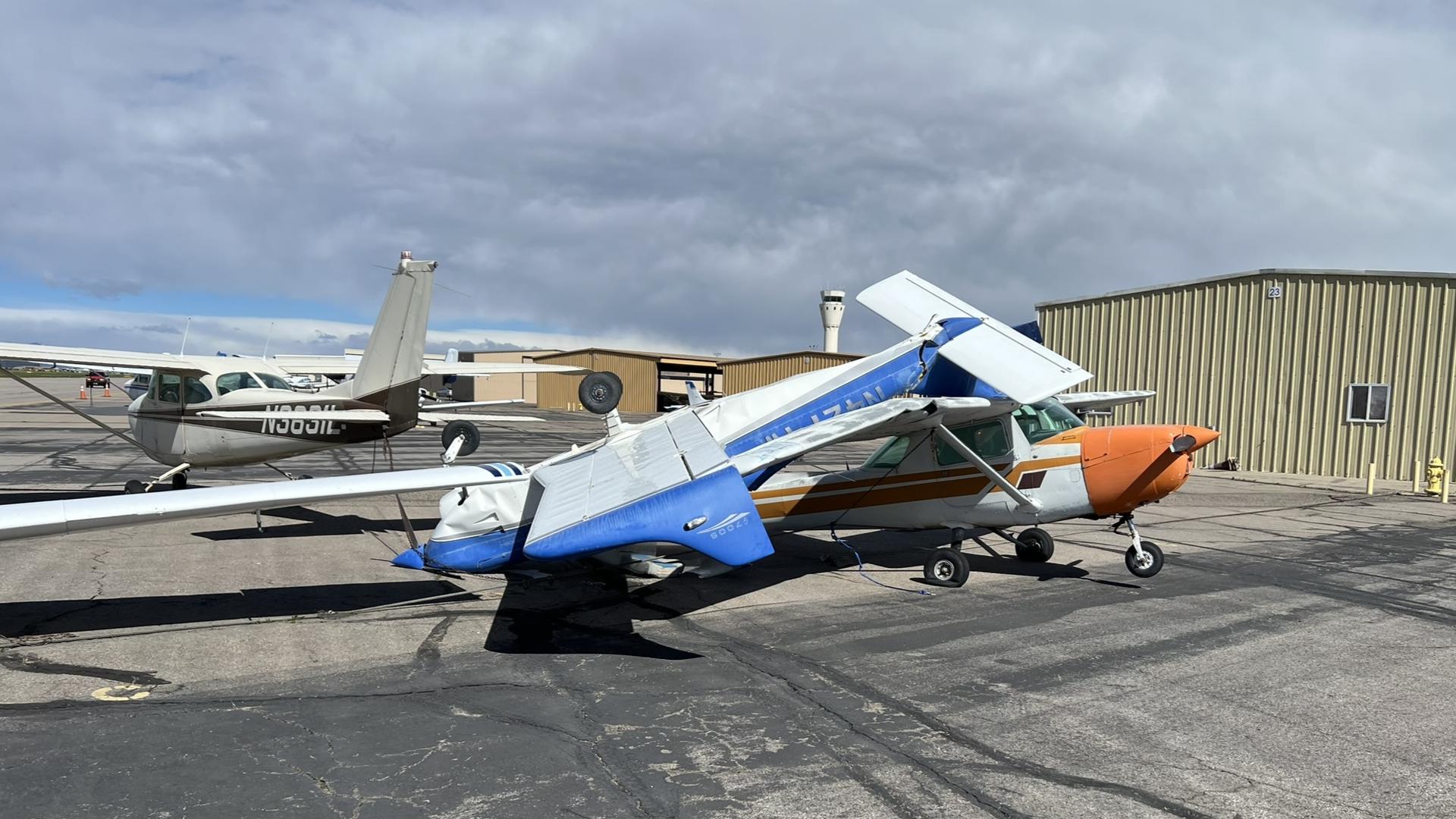 Wind flips plane onto another plane at Centennial Airport | 9news.com