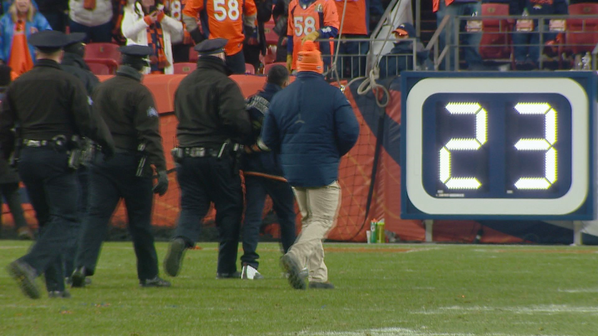 Denver Broncos security guard breaks ankle tacking fan | 9news.com