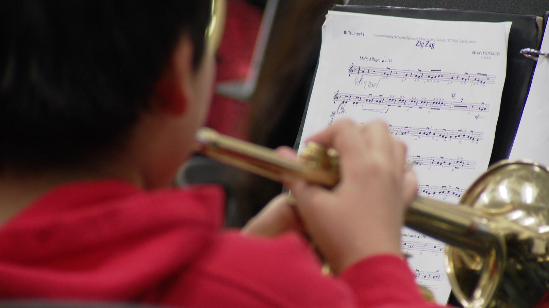 Nonprofit boosts Vikan Middle School band with instrument drive | 9news.com