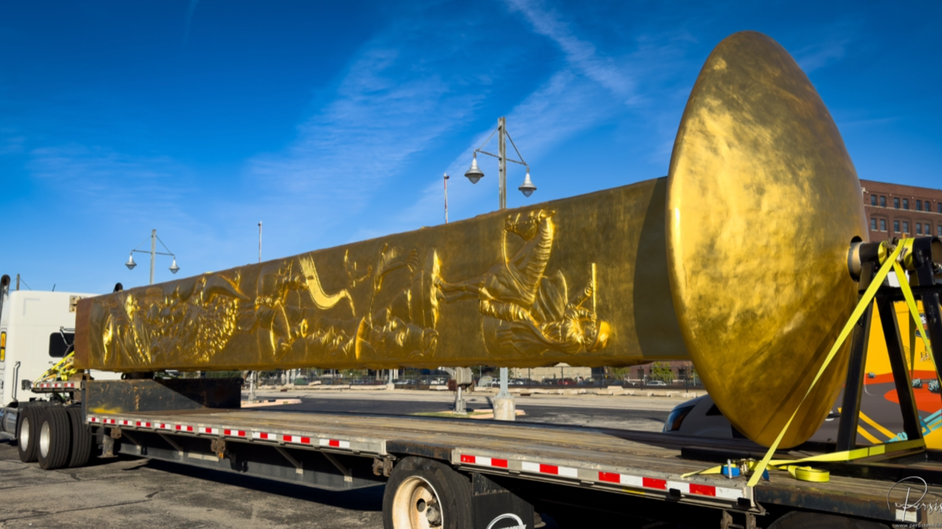 43-foot-tall golden spike monument visiting Colorado, Wyoming | 9news.com