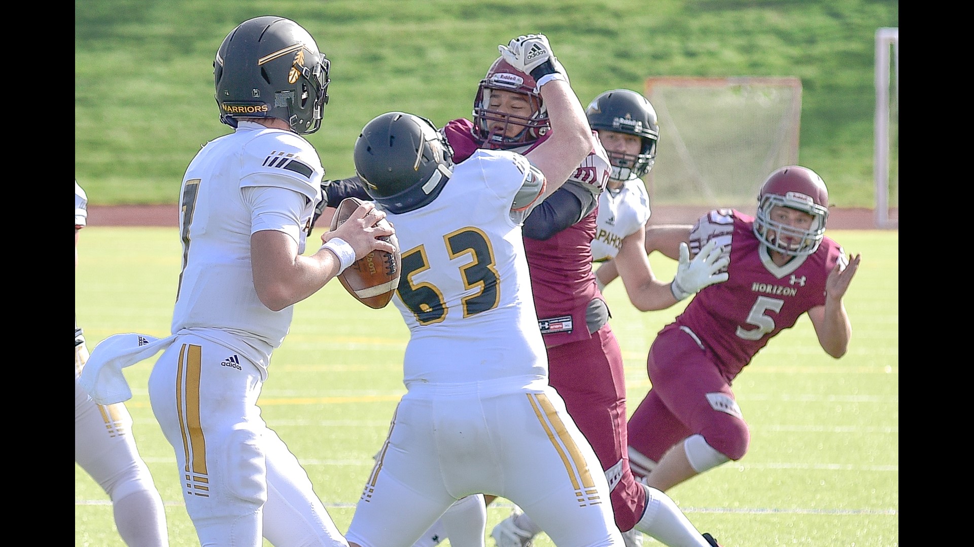 PHOTOS: Arapahoe vs. Horizon football by Steve Oathout | 9news.com