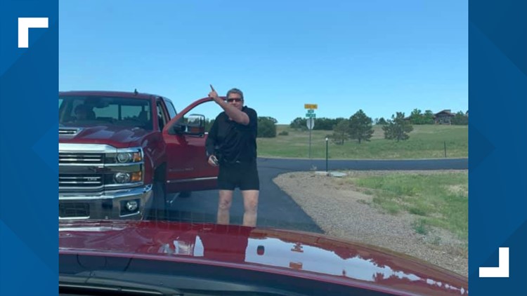 Images show local CEO pull gun on hispanic man who got lost | 9news.com