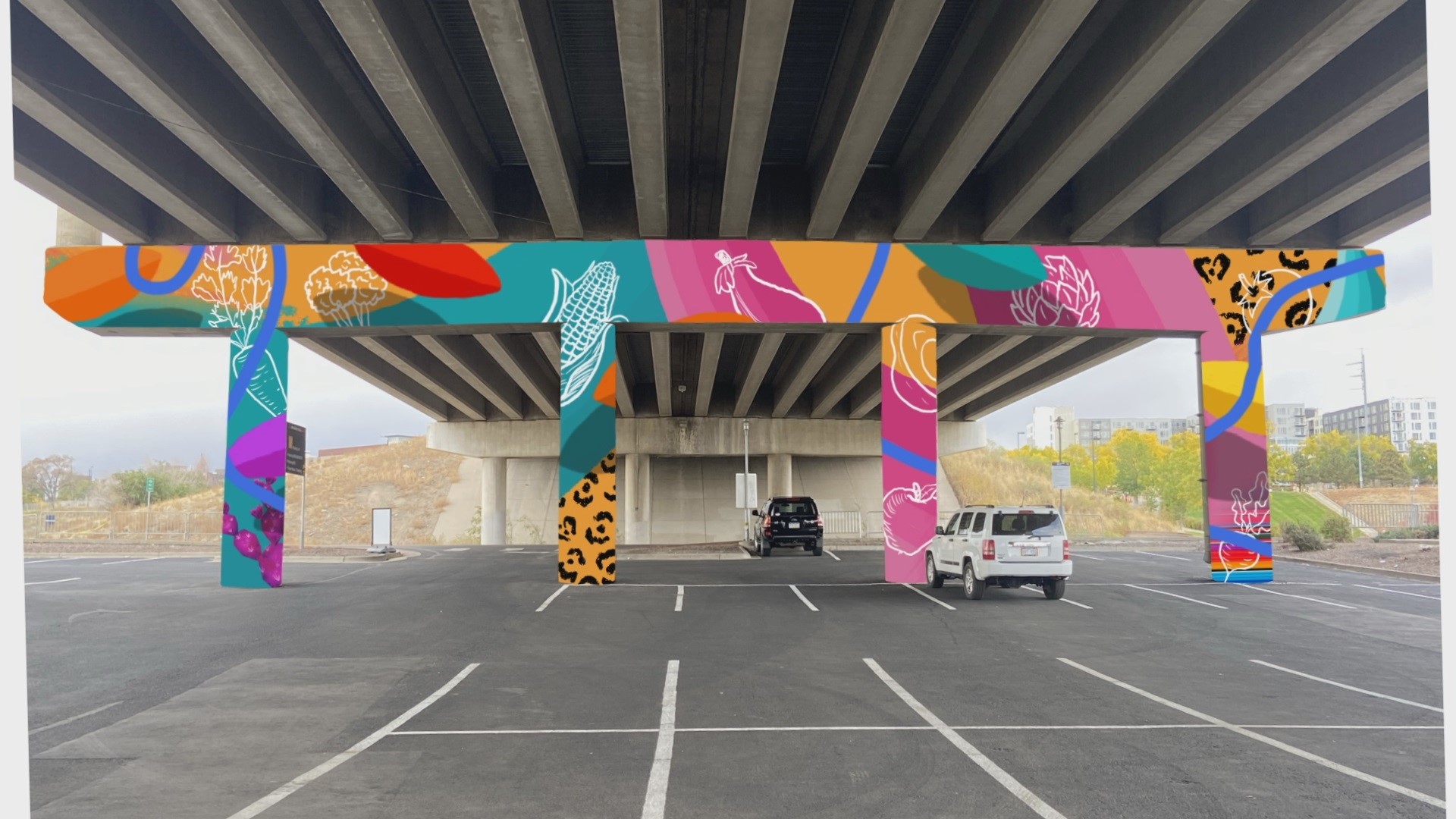Muralists painting area under West Colfax bridge near Mile High | 9news.com