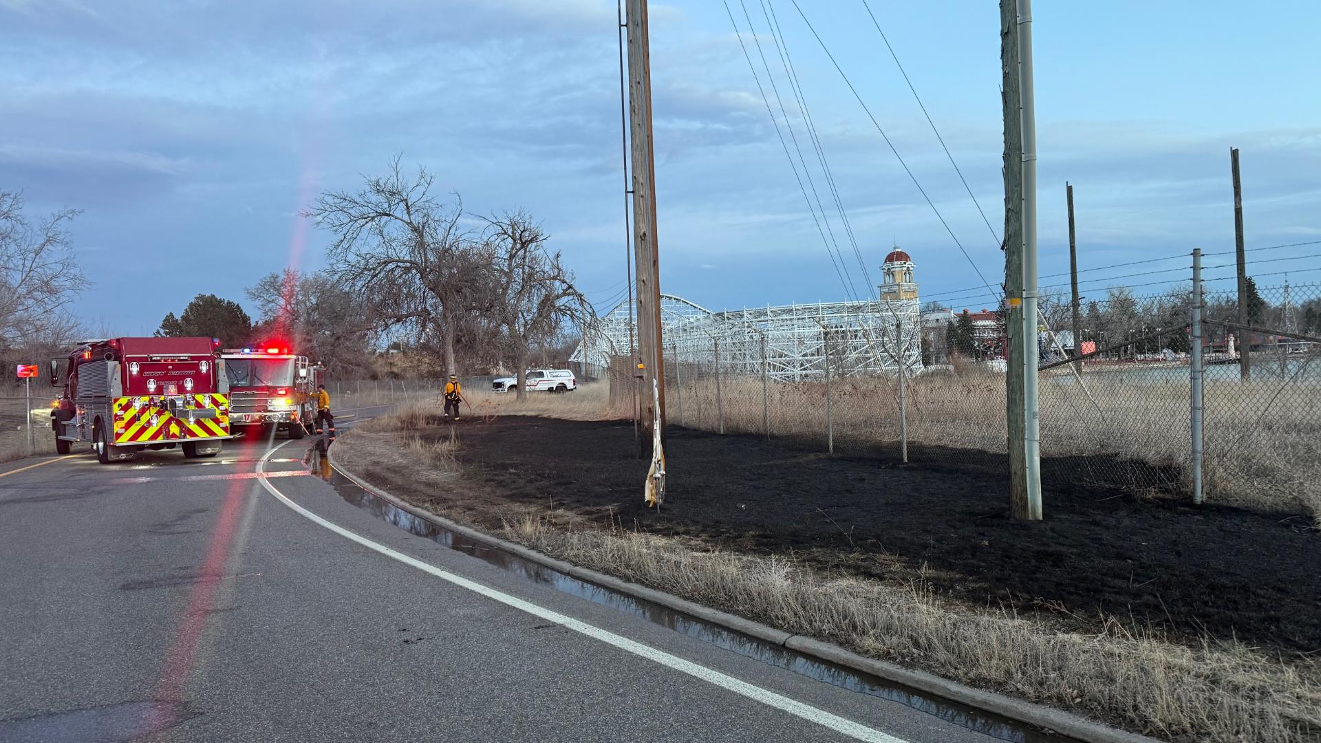 Grass fire near amusement park puts off heavy smoke over I-70 west of ...
