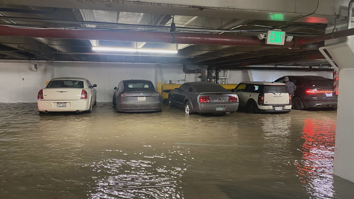 Water main break floods underground garage, damages cars | 9news.com