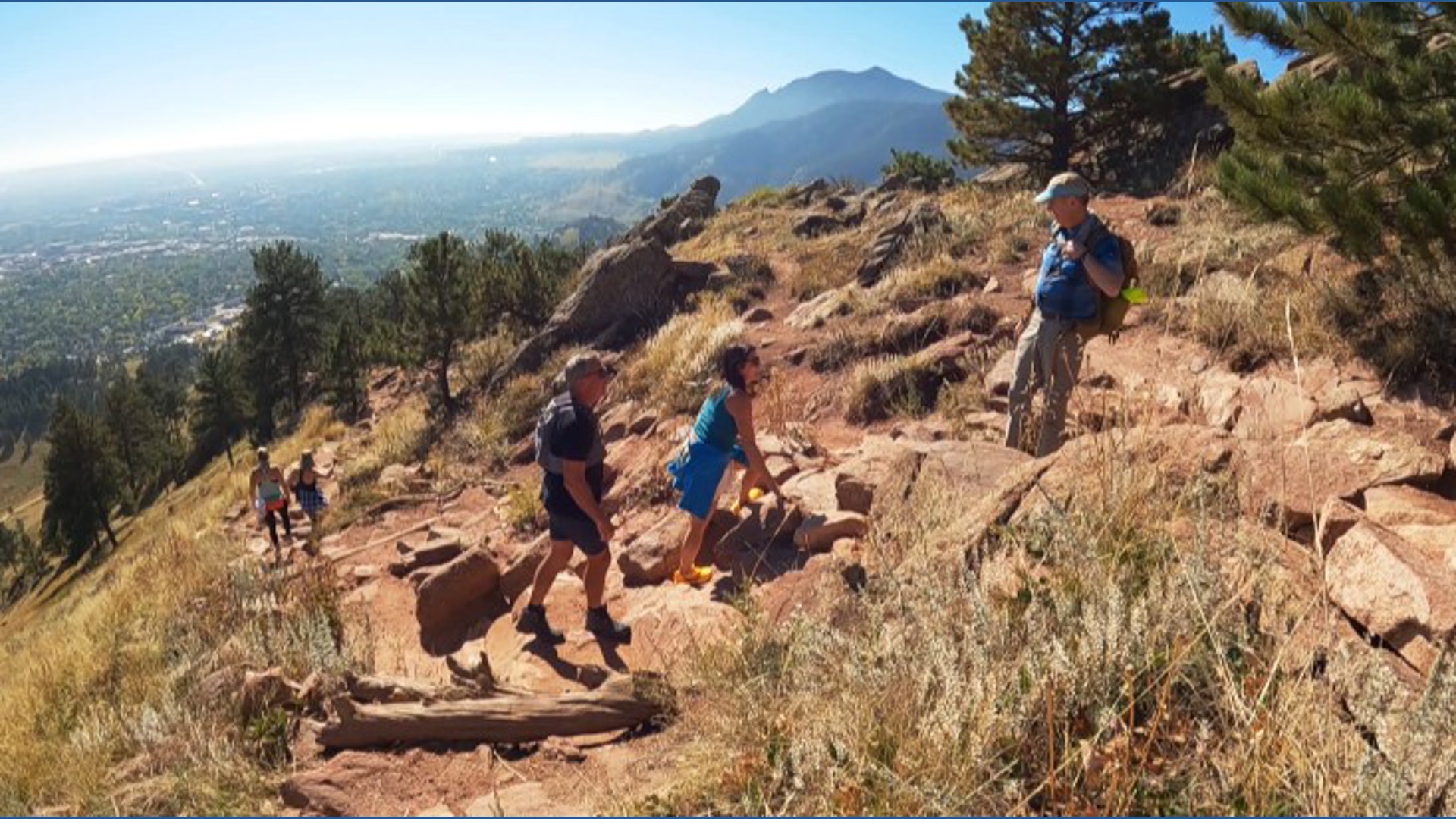 Boulder hiker known as the 'Hat Man' spreads kindness, one free hat at ...