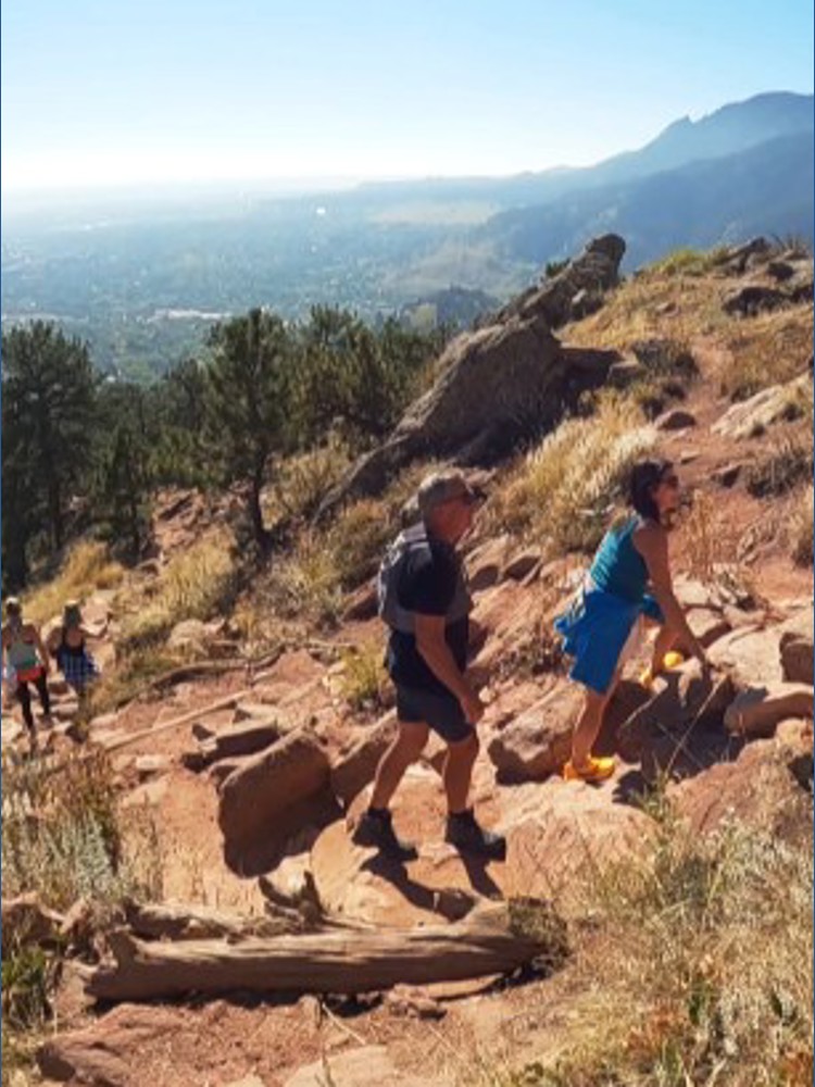 Boulder hiker known as the 'Hat Man' spreads kindness, one free hat at ...