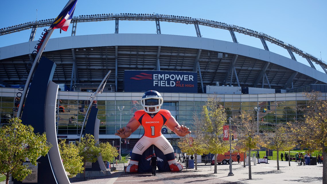 New playing field installed at Empower Field | 9news.com