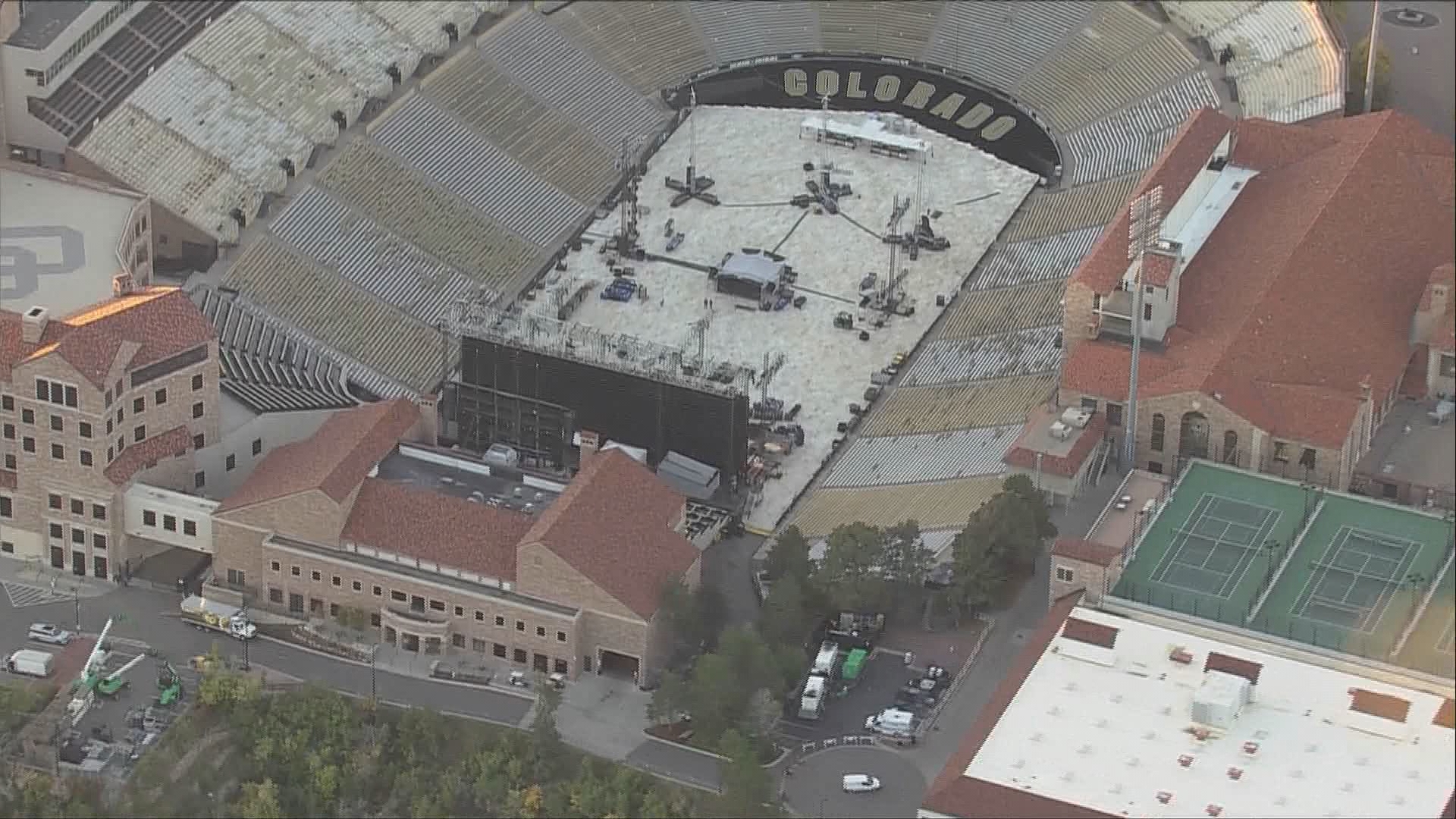 Crews set up for John Summit at CU's Folsom Field | 9news.com