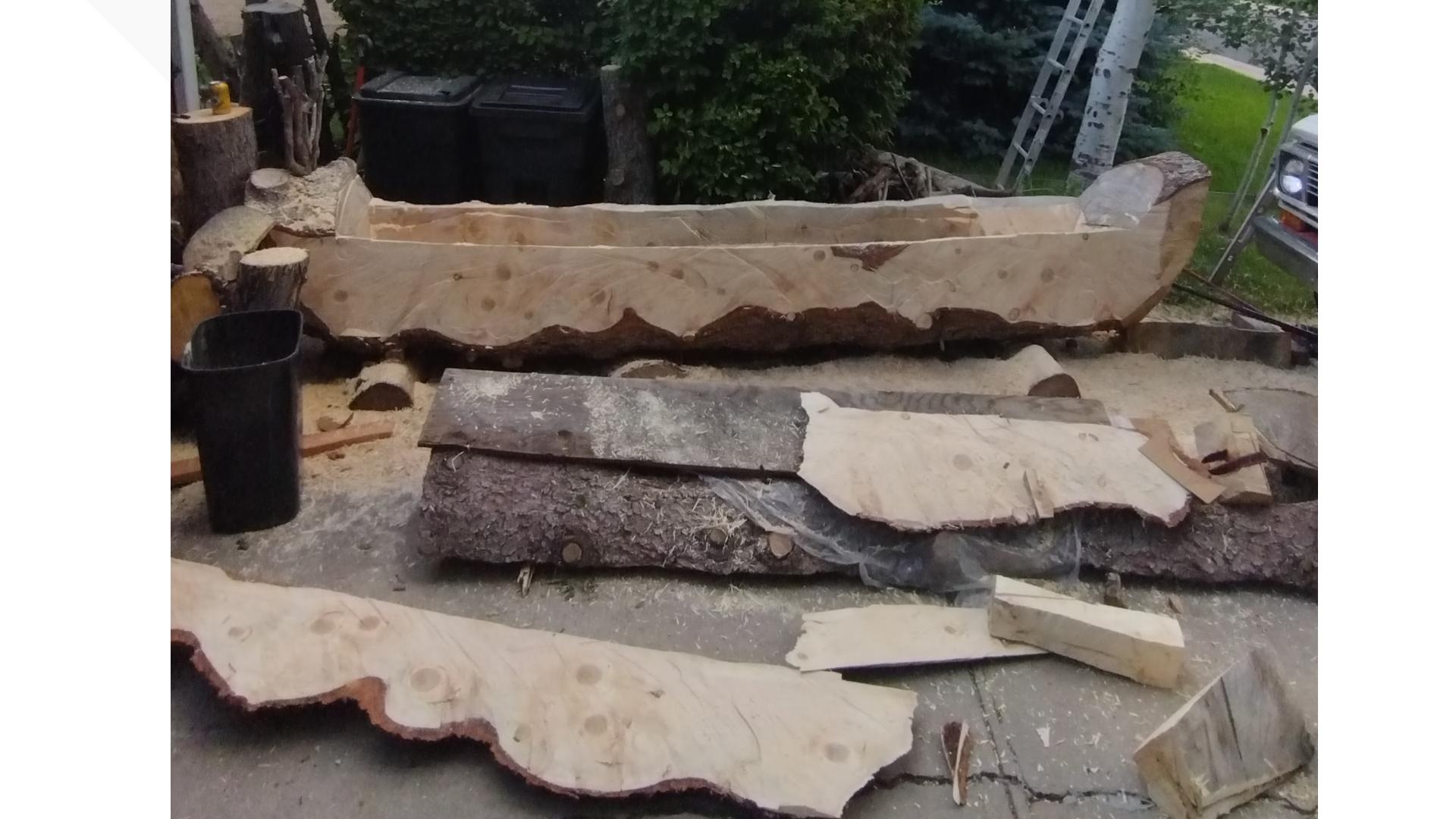 Artist builds dragon boat from fallen tree after storm | 9news.com