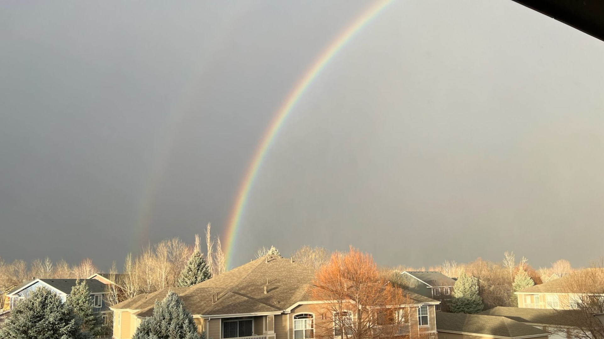 Wind, snow storm arrives in Colorado with rainbow seen in Denver ...