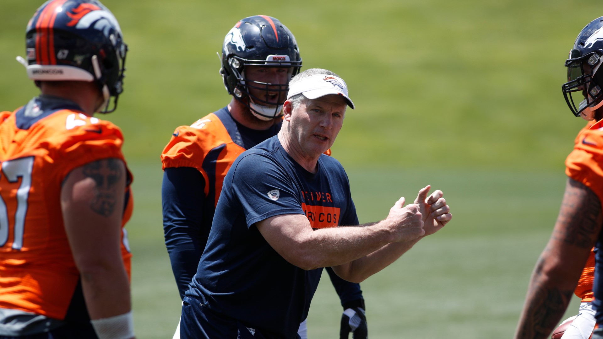Broncos offensive line coach Munchak in COVID protocol | 9news.com