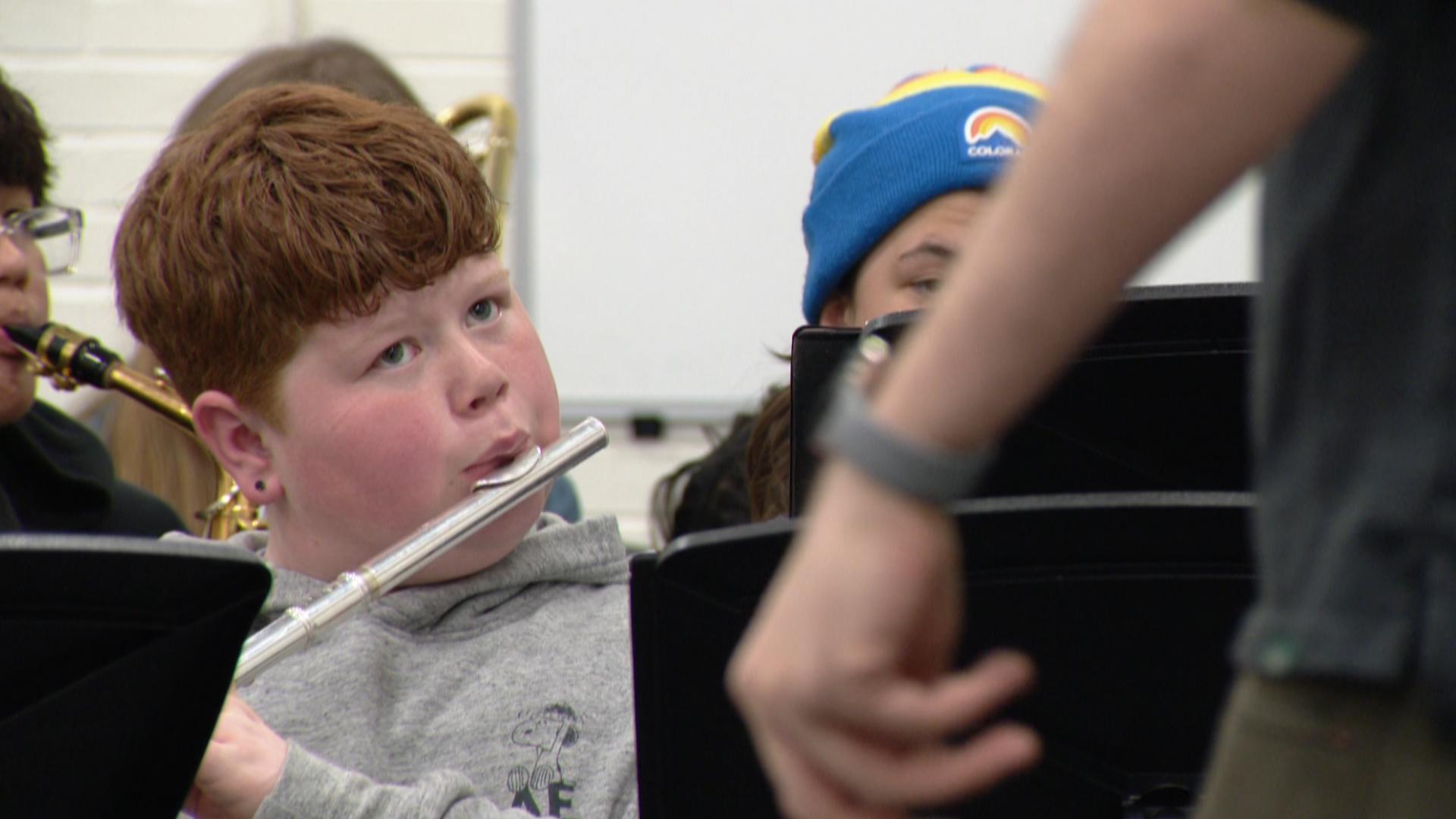 Nonprofit boosts Vikan Middle School band with instrument drive | 9news.com