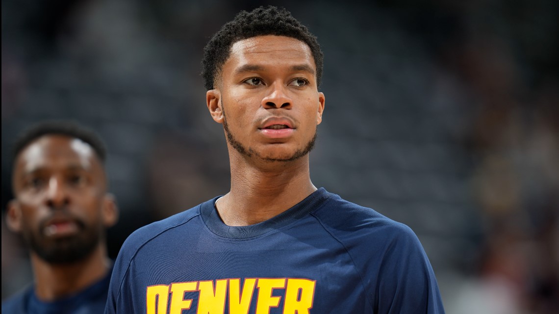 Nuggets announce P.J. Dozier tore his ACL | 9news.com