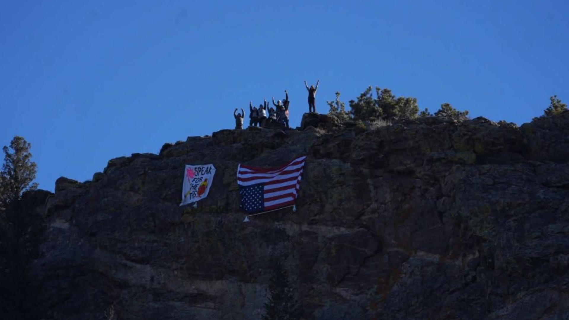 Group hangs US flags upside-down in RMNP | 9news.com