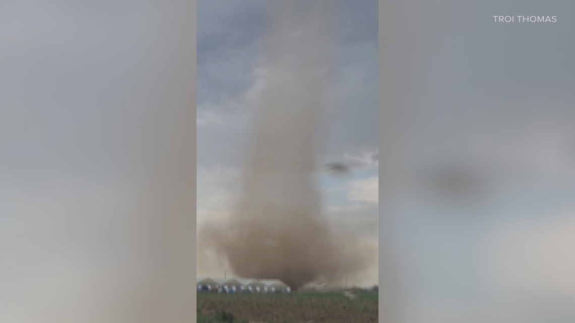 Landspout tornado seen near Lochbuie, north of DIA Friday | 9news.com