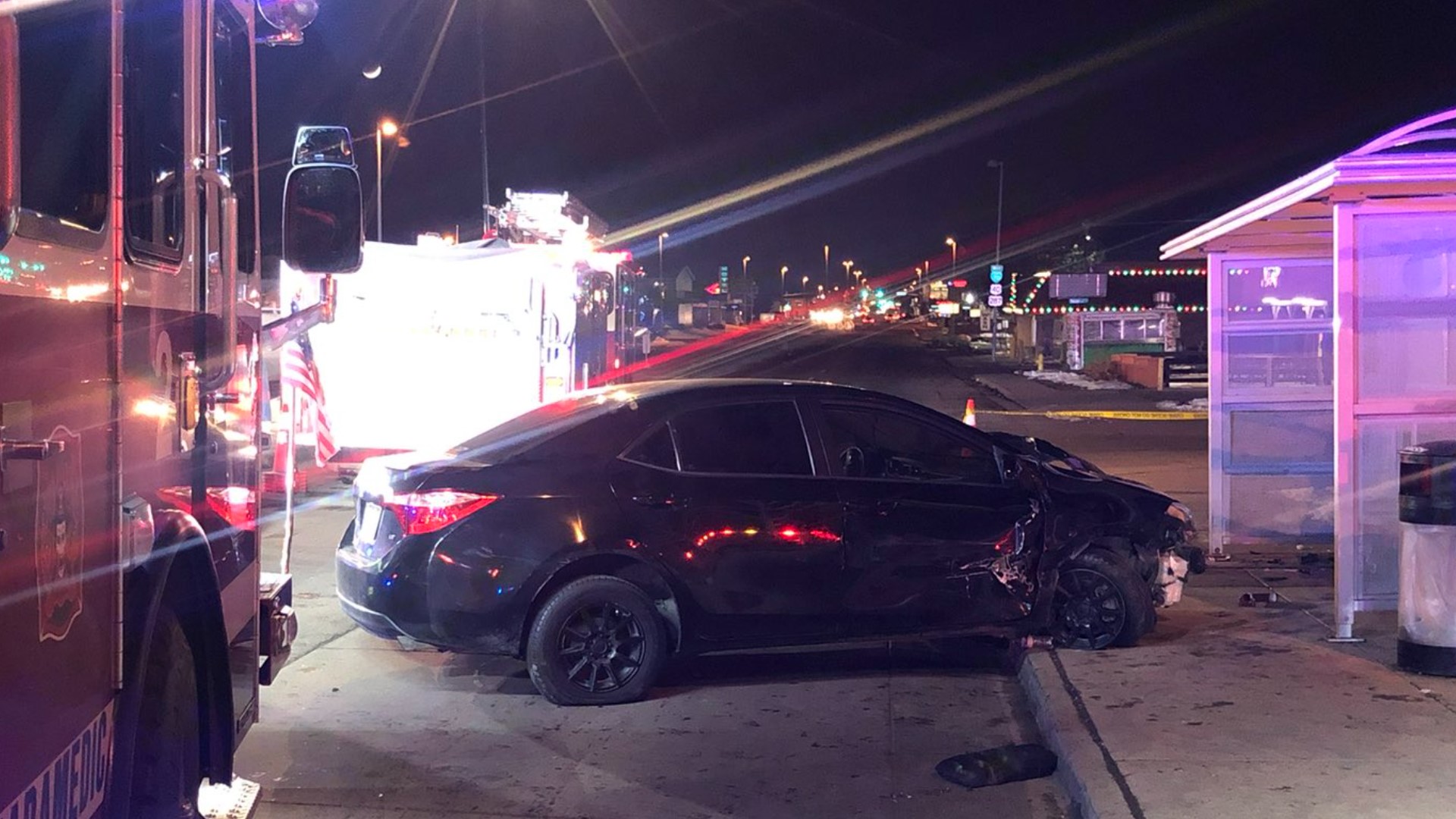 2 hurt in Aurora bus stop crash on East Colfax Avenue | 9news.com