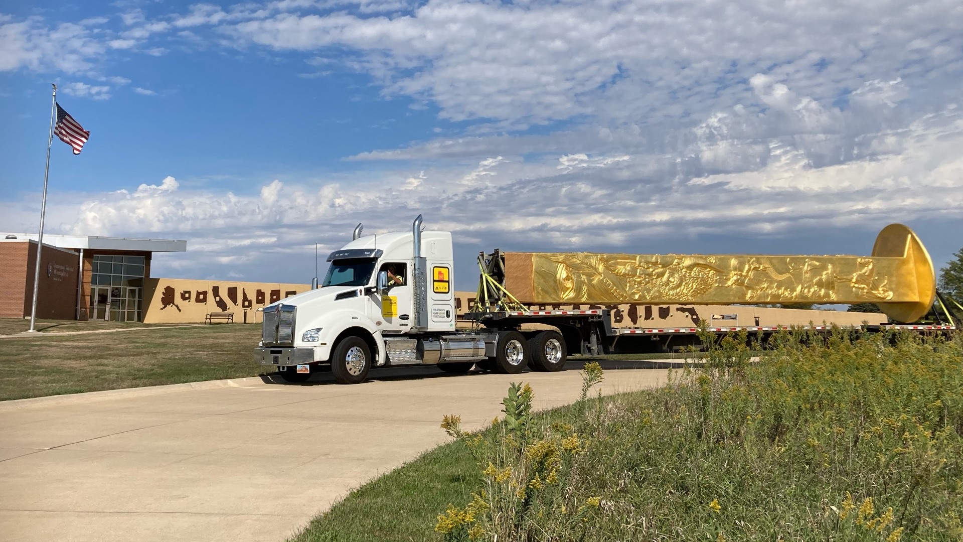43-foot-tall golden spike monument visiting Colorado, Wyoming | 9news.com