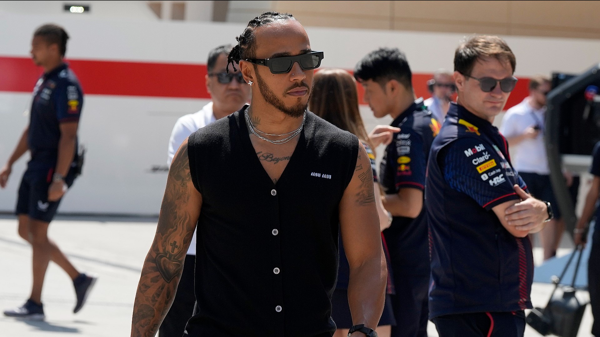 Broncos co-owner Lewis Hamilton arrives in Maranello for his 1st day at ...