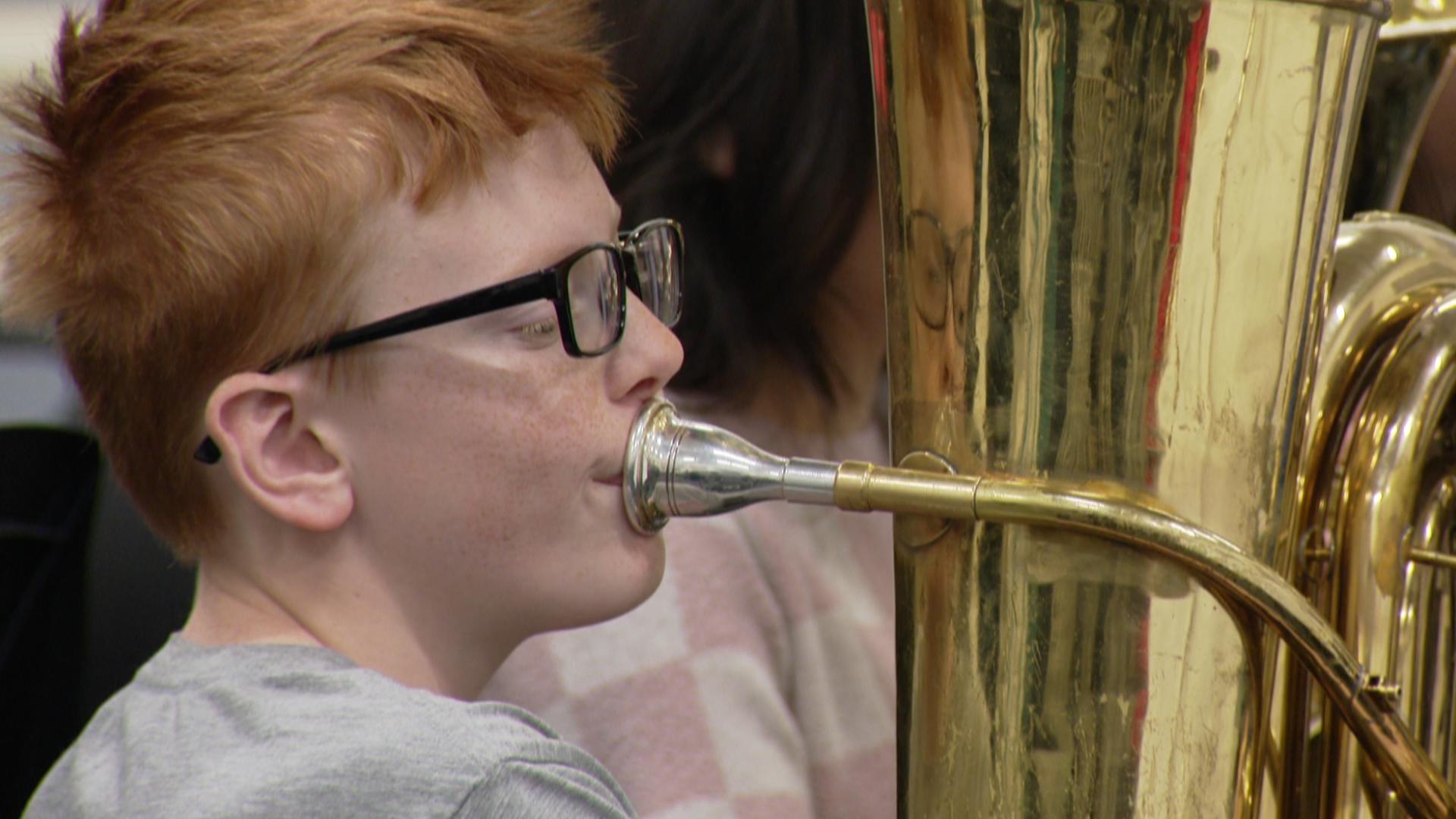 Nonprofit boosts Vikan Middle School band with instrument drive | 9news.com