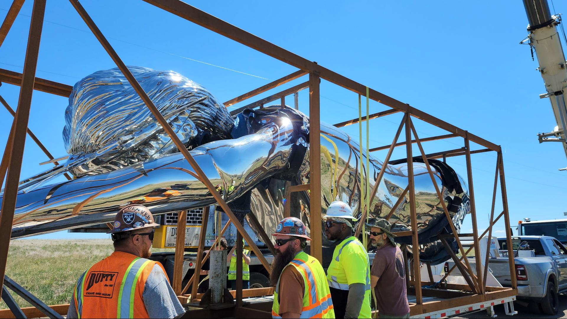 New 58-foot tall 'Liberty' art sculpture installed at The Aurora ...