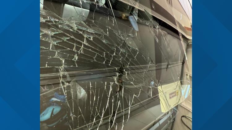 Centennial woman's windshield hit by objects thrown from truck | 9news.com