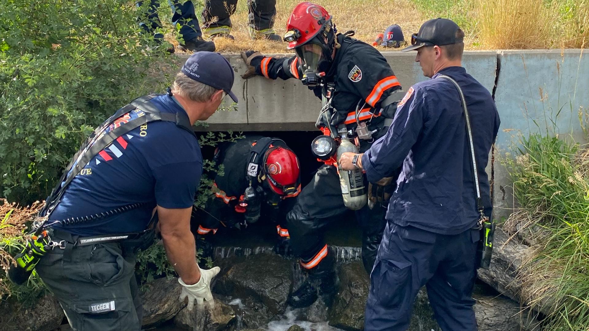 Colorado firefighters rescue man trapped in storm drain | 9news.com