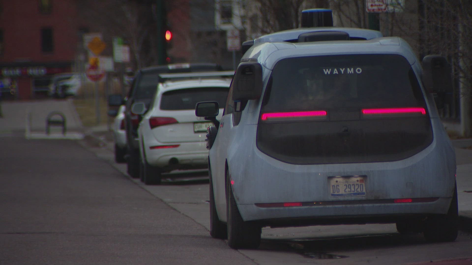 Waymo vehicle parked in Denver bike lane during training; company says human driver to blame ...