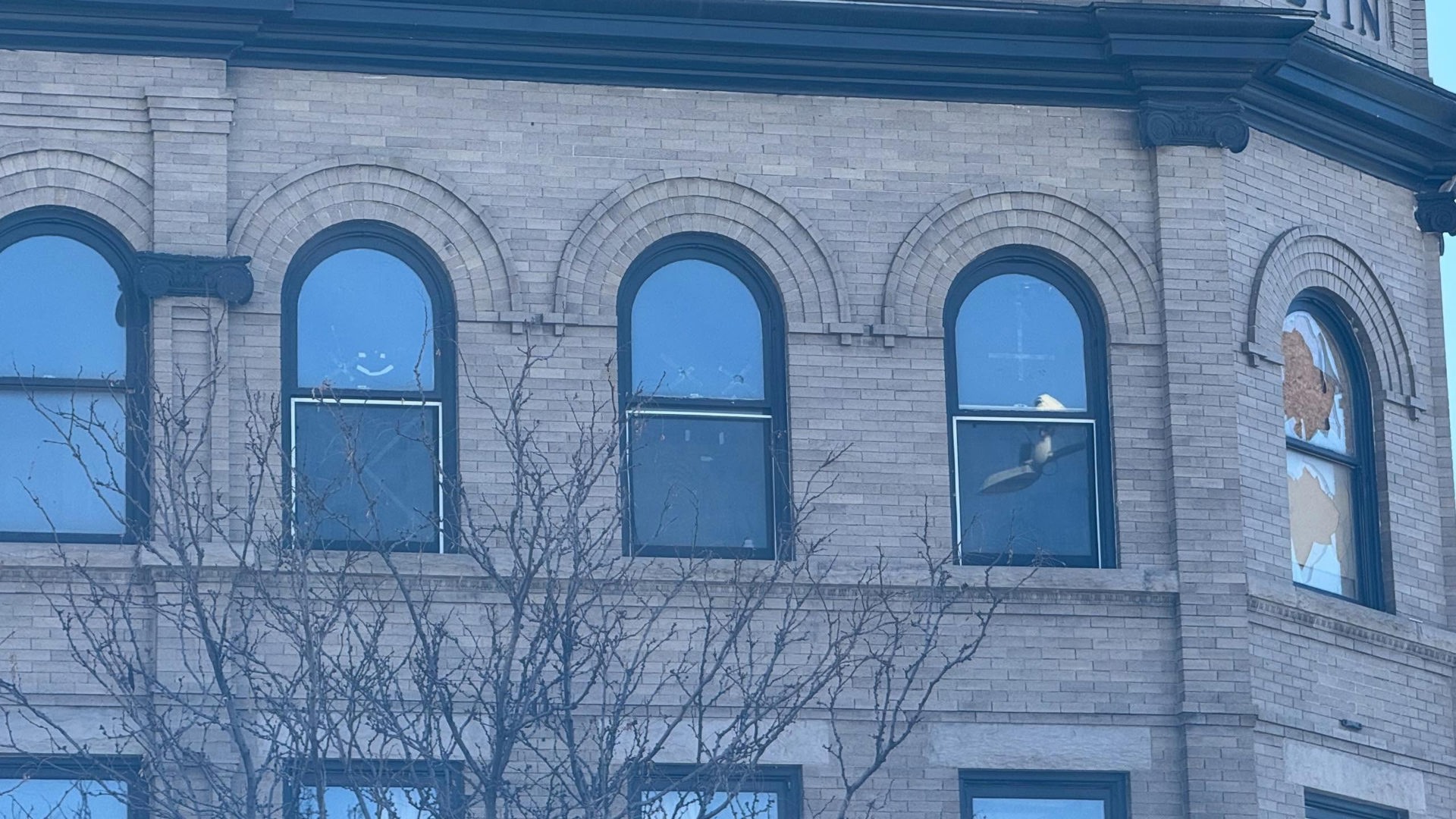 Hate symbols removed from apartment windows in Denver | 9news.com