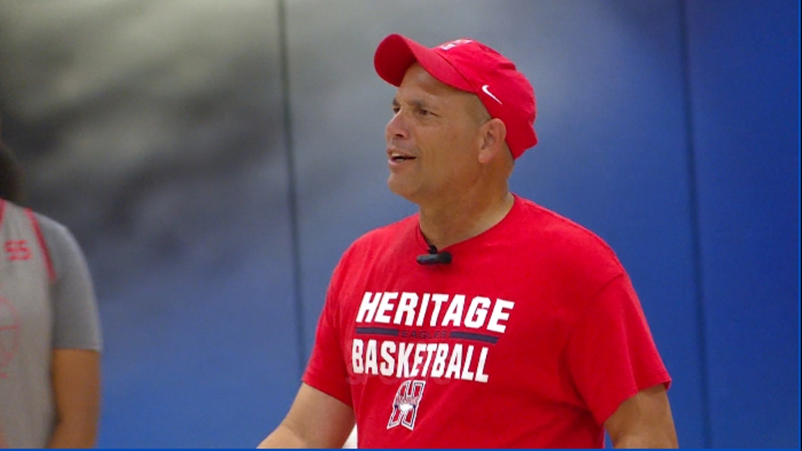 New Heritage coach begins tenure with free basketball clinic | 9news.com