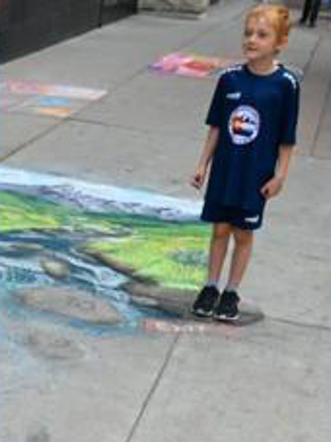 Chalk artists create vibrant murals at SouthGlenn festival | 9news.com