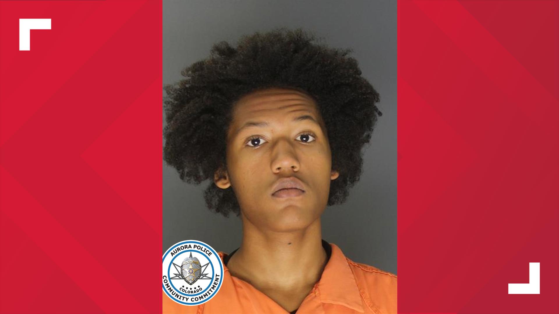 Man arrested in shooting outside Aurora liquor store | 9news.com