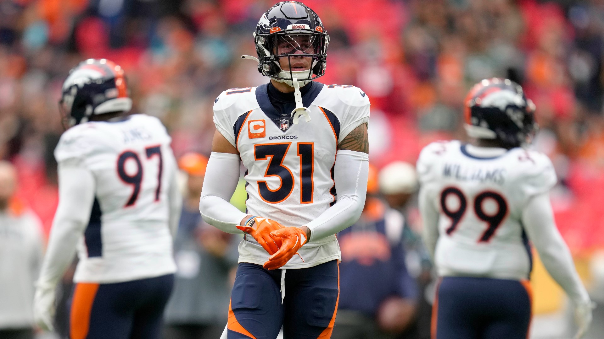 Denver Broncos orange-blue stripe uniform combo returns vs Titans ...