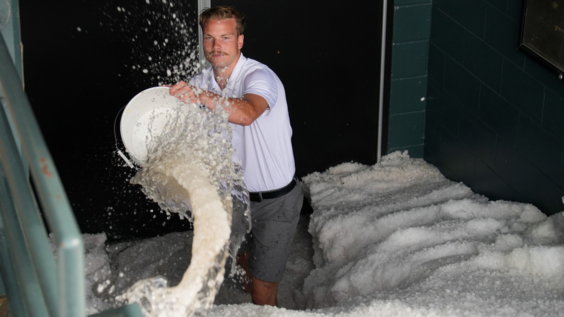 Hail makes Coors Field a winter wonderland ahead of Dodgers game ...