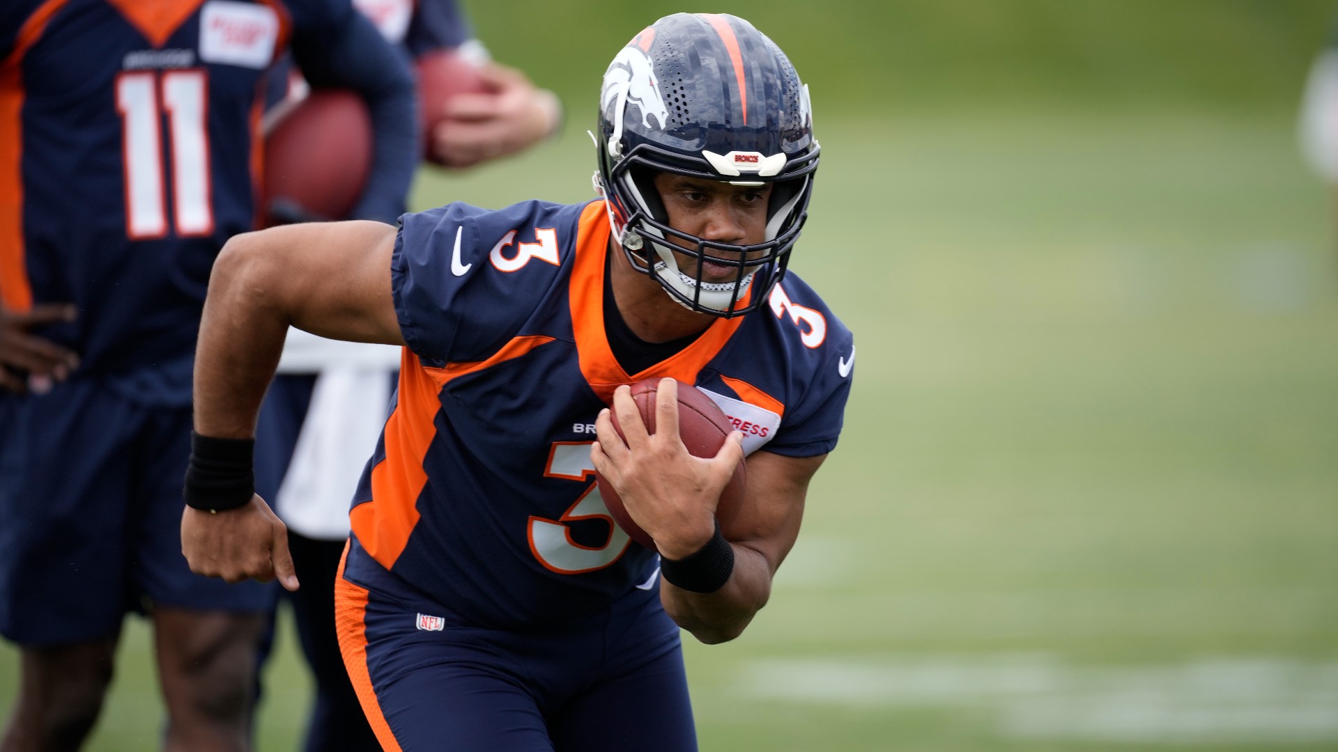 Russell Wilson makes Denver Broncos OTA debut | 9news.com
