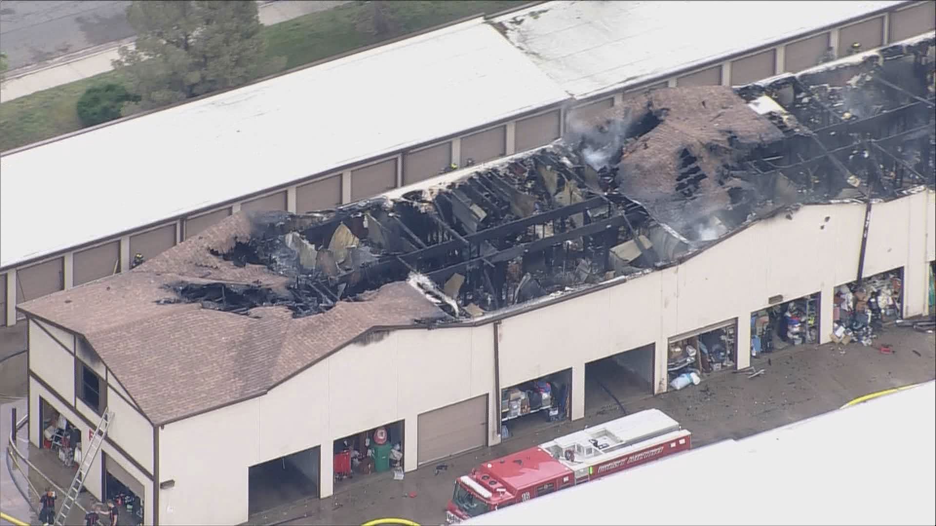 2 firefighters injured battling storage unit fire in Arvada | 9news.com