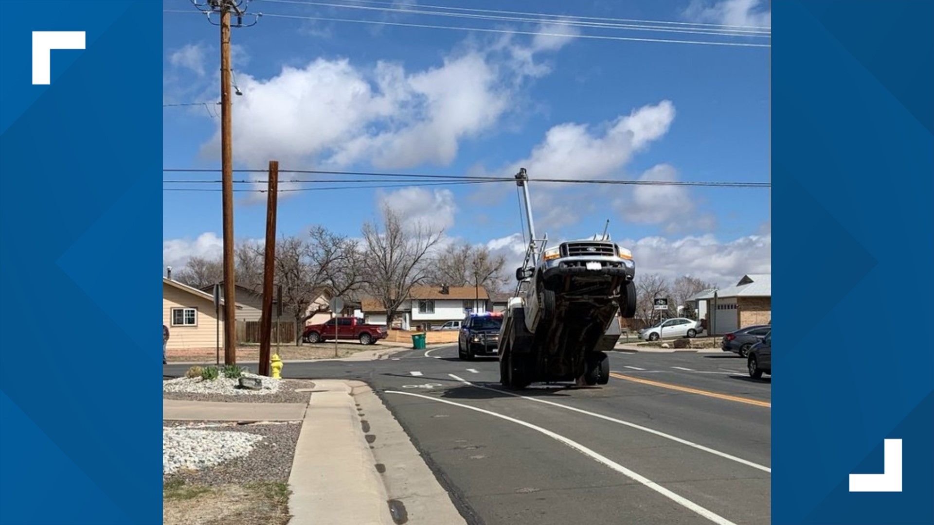 Truck gets stuck in overhead telecom lines in Brighton, CO | 9news.com