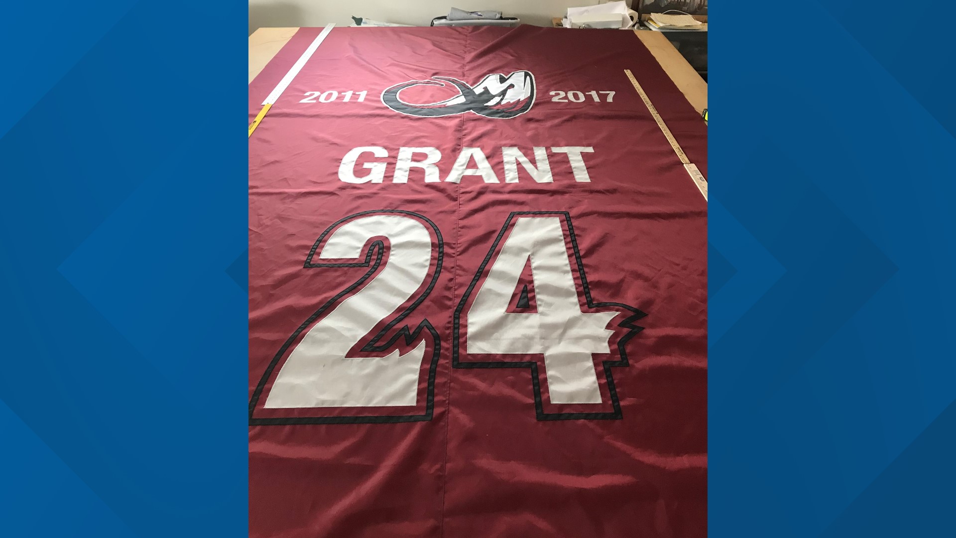 Local business creates championship banners for Colorado teams | 9news.com