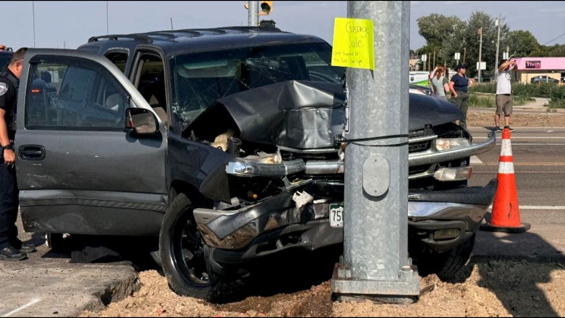 Driver hits woman's car during police pursuit, injuring her | 9news.com