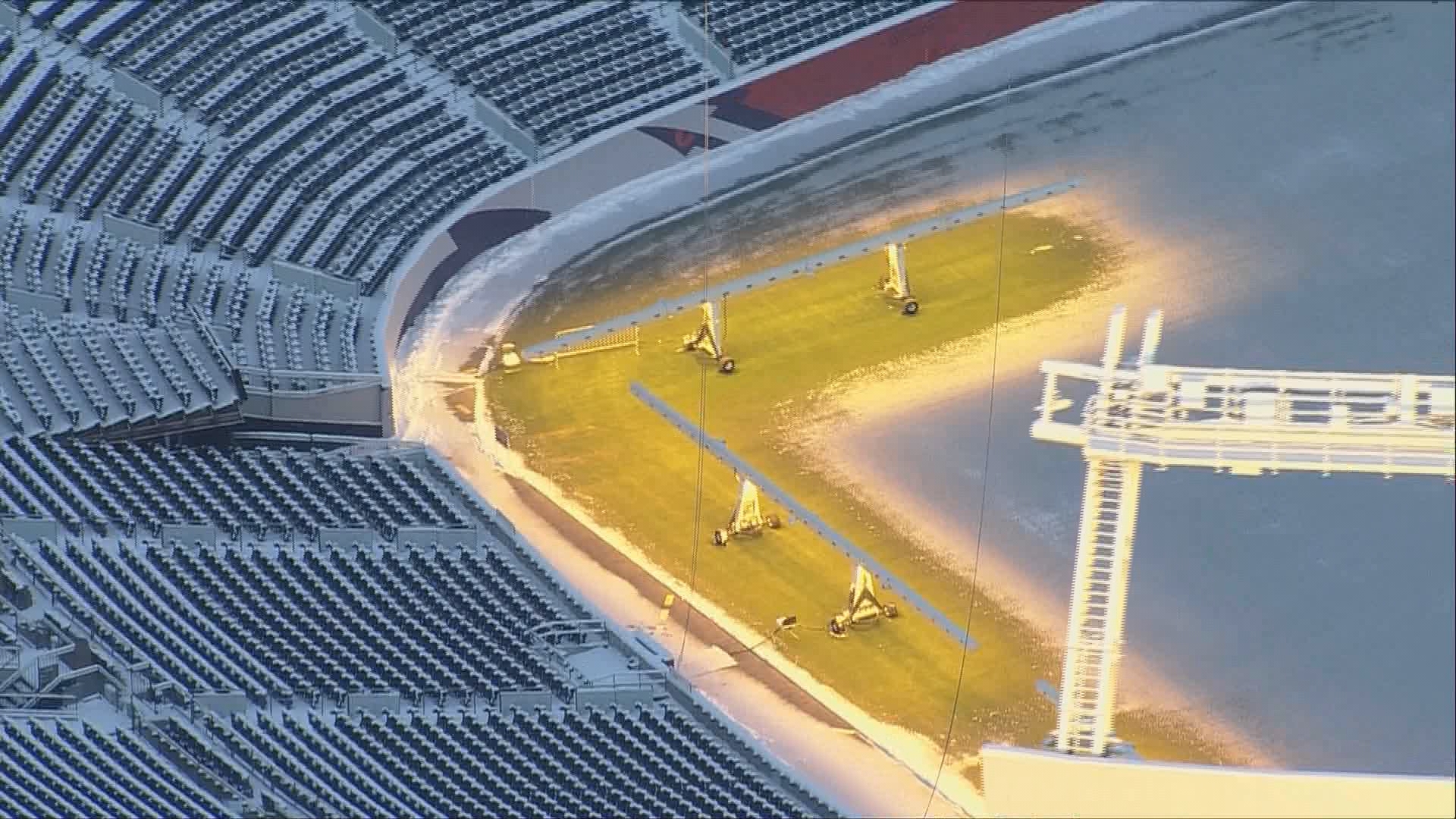 Mystical glow in Denver is just the Broncos growing grass | 9news.com