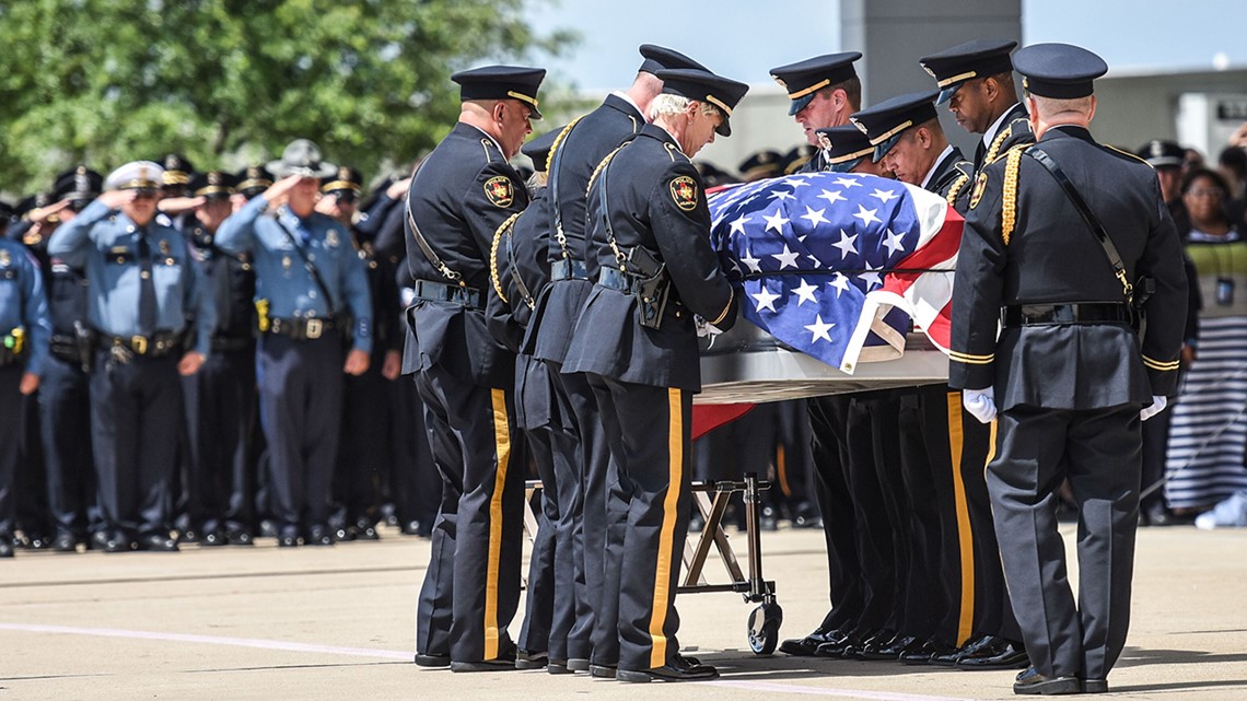 Funerals for two Dallas officers killed in ambush | 9news.com