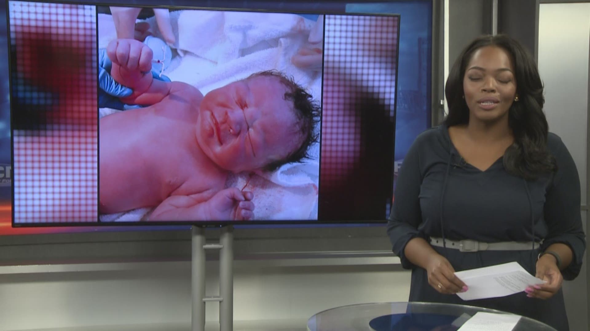 VERIFY: Was this baby born with an IUD in his hand? | 9news.com
