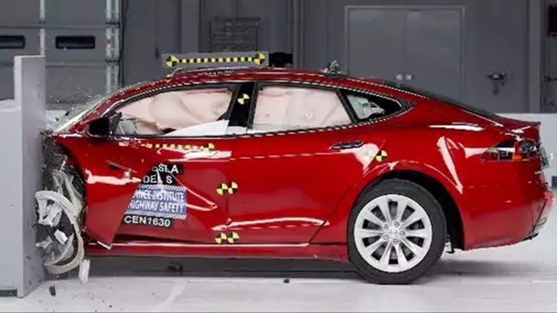 Tesla's electric car falls short in new IIHS crash tests | 9news.com